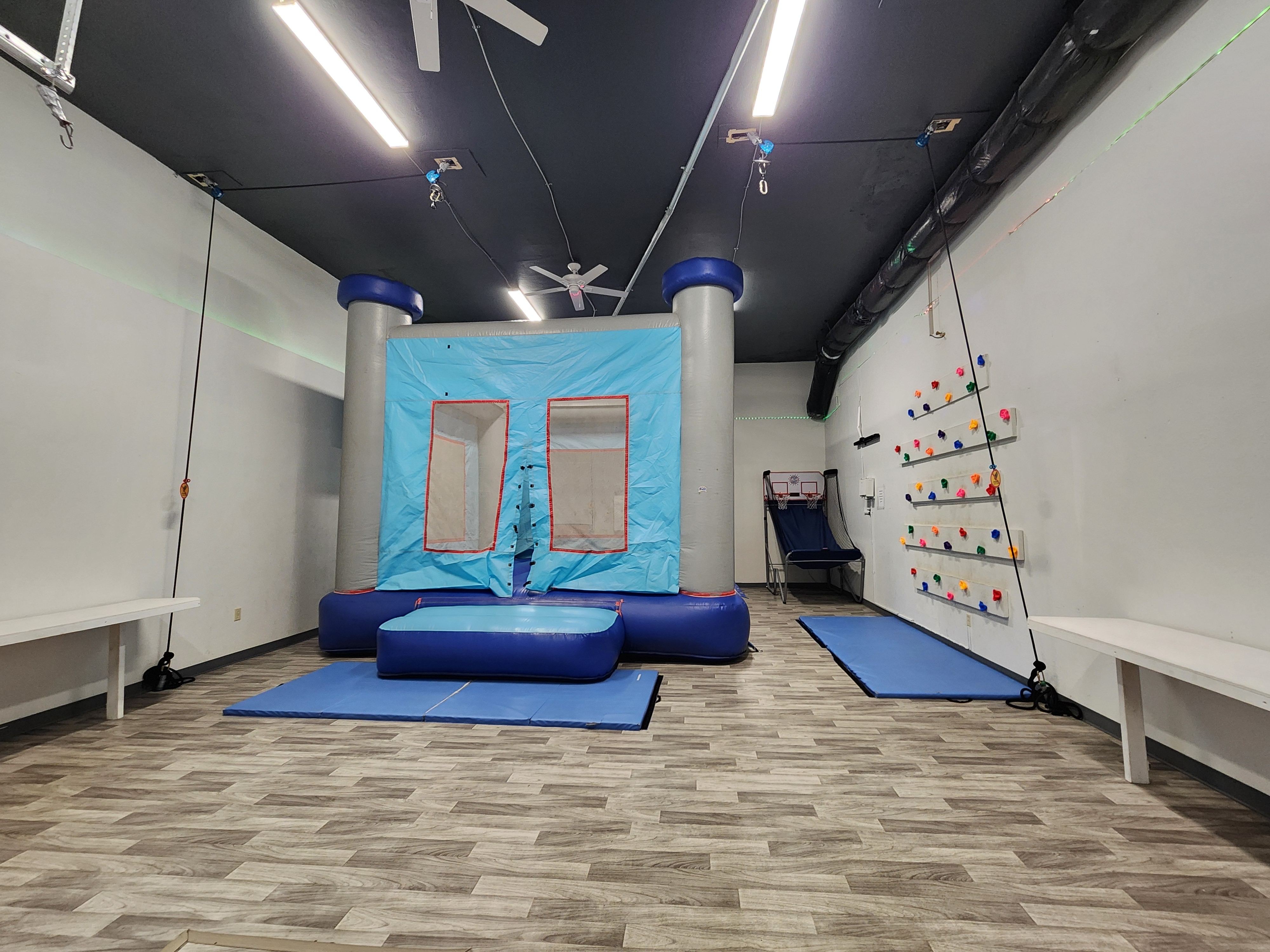 Party room with basic bouncer | Party Masters, circus aerial school ...