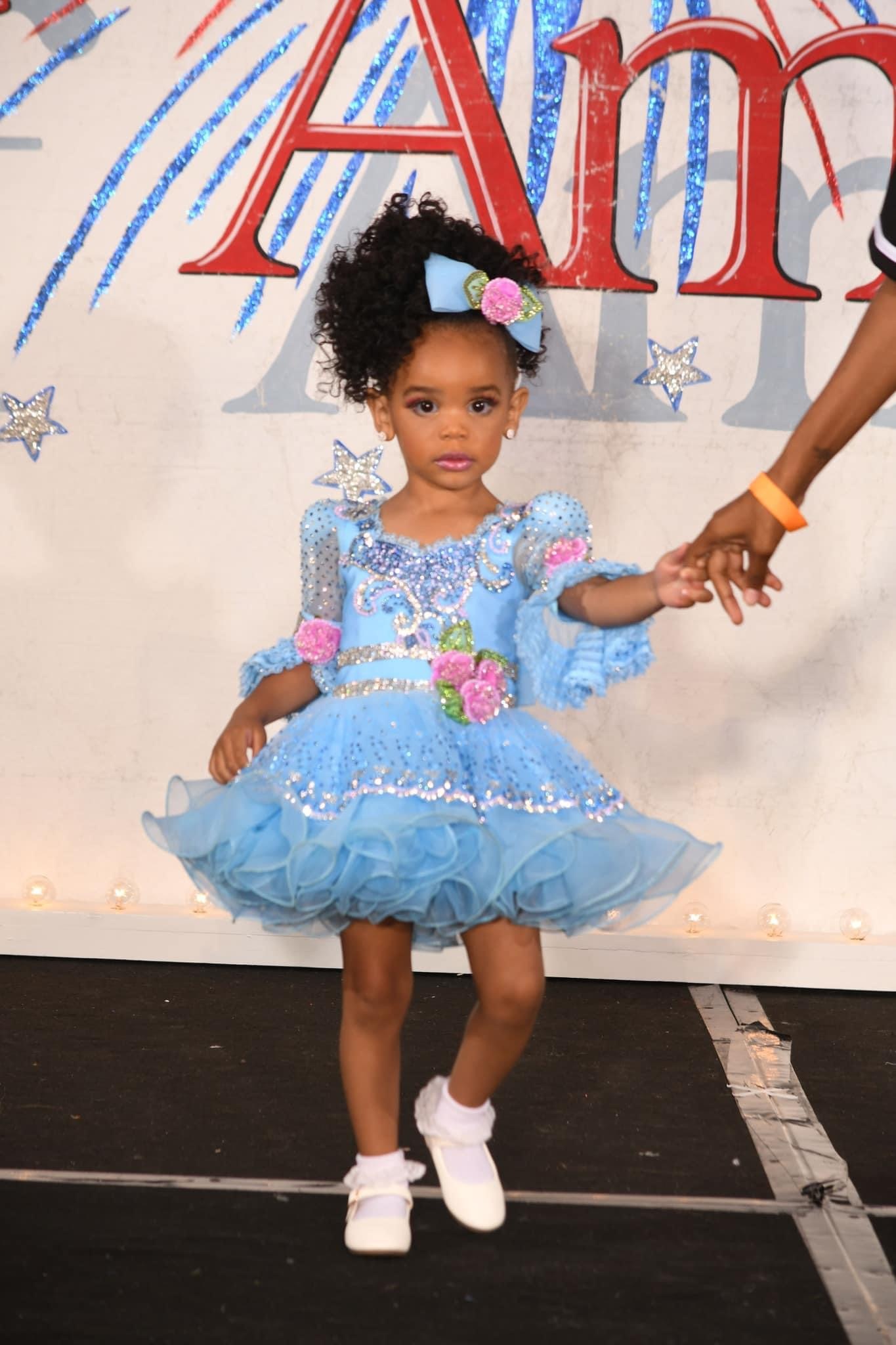 27. A- Blue Ruby Belle glitz dress | Mallie´s Closet Pageant Rentals